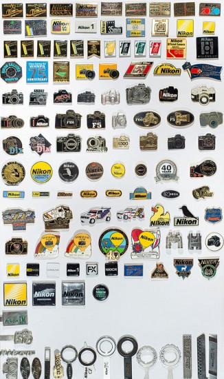 Check out this Nikon pins and phone cards collection - Nikon Rumors