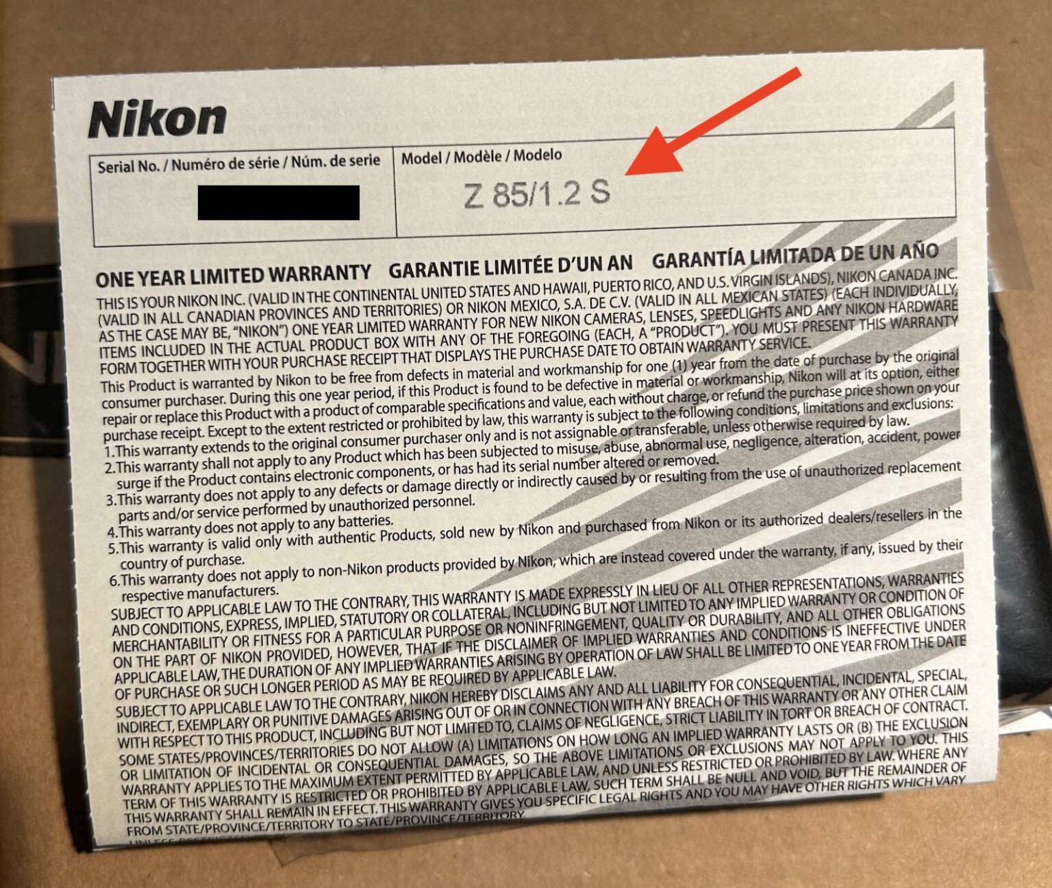 A reader buys a Nikkor Z 35mm f/1.8 S lens, gets a warranty for a "Z 85 ...